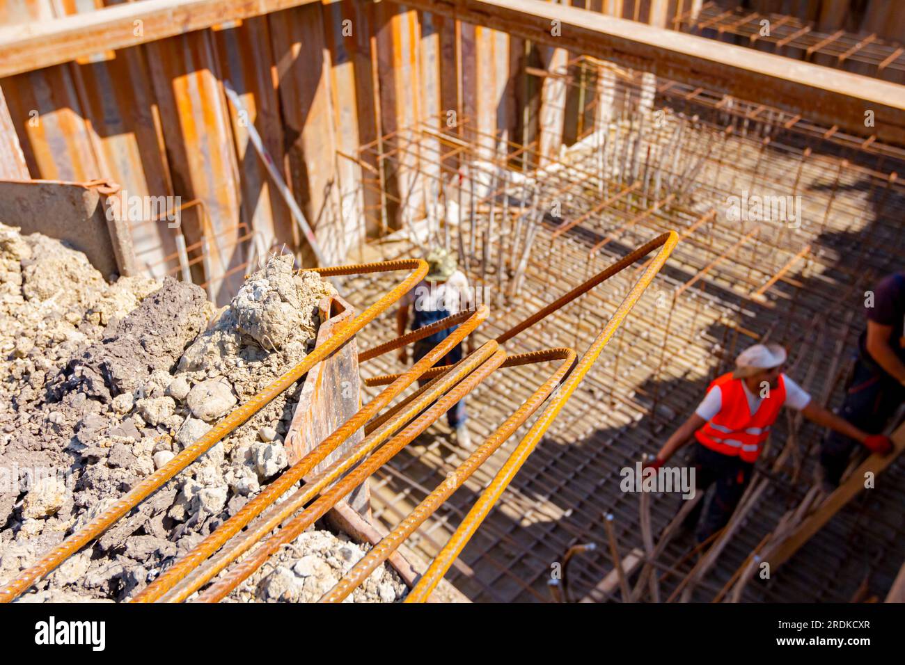 Selected rusty steel bended reinforcement bars placed at construction ...