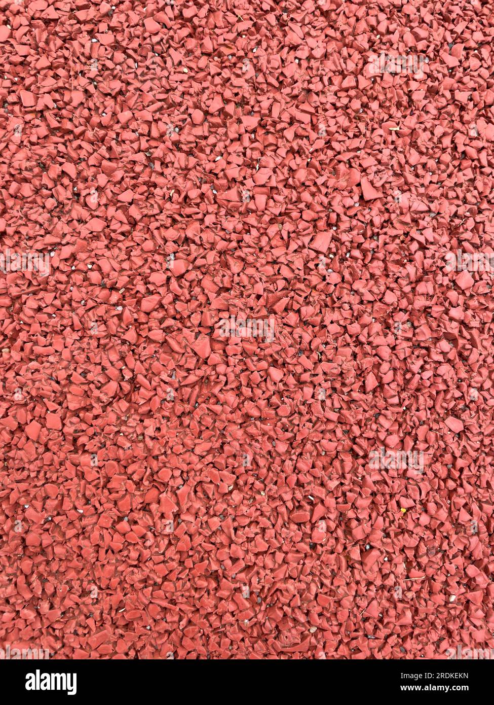 Red all-weather synthetic track surfacing made of polyurethane used for ...