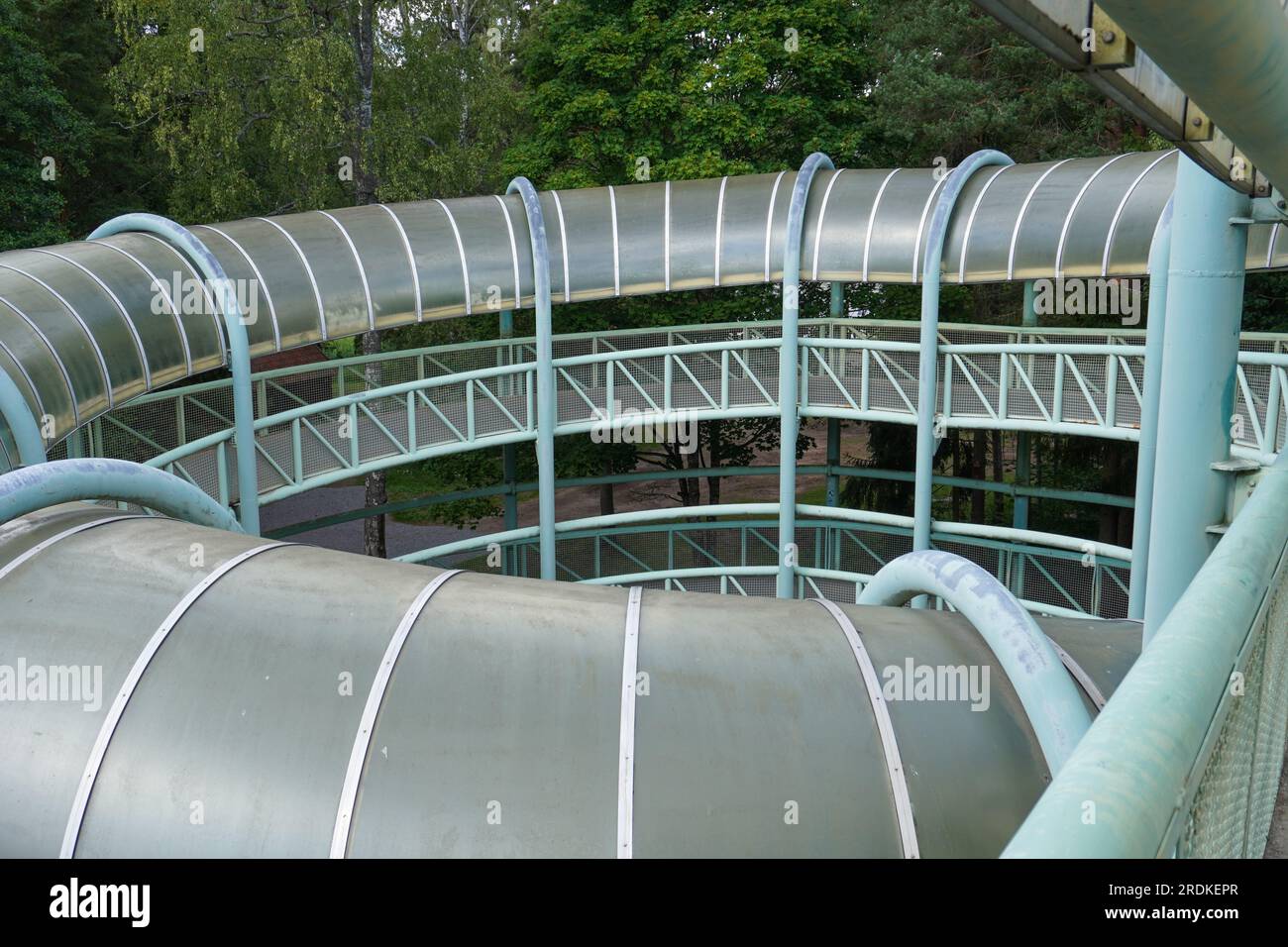 view of a green round footbridge Stock Photo - Alamy