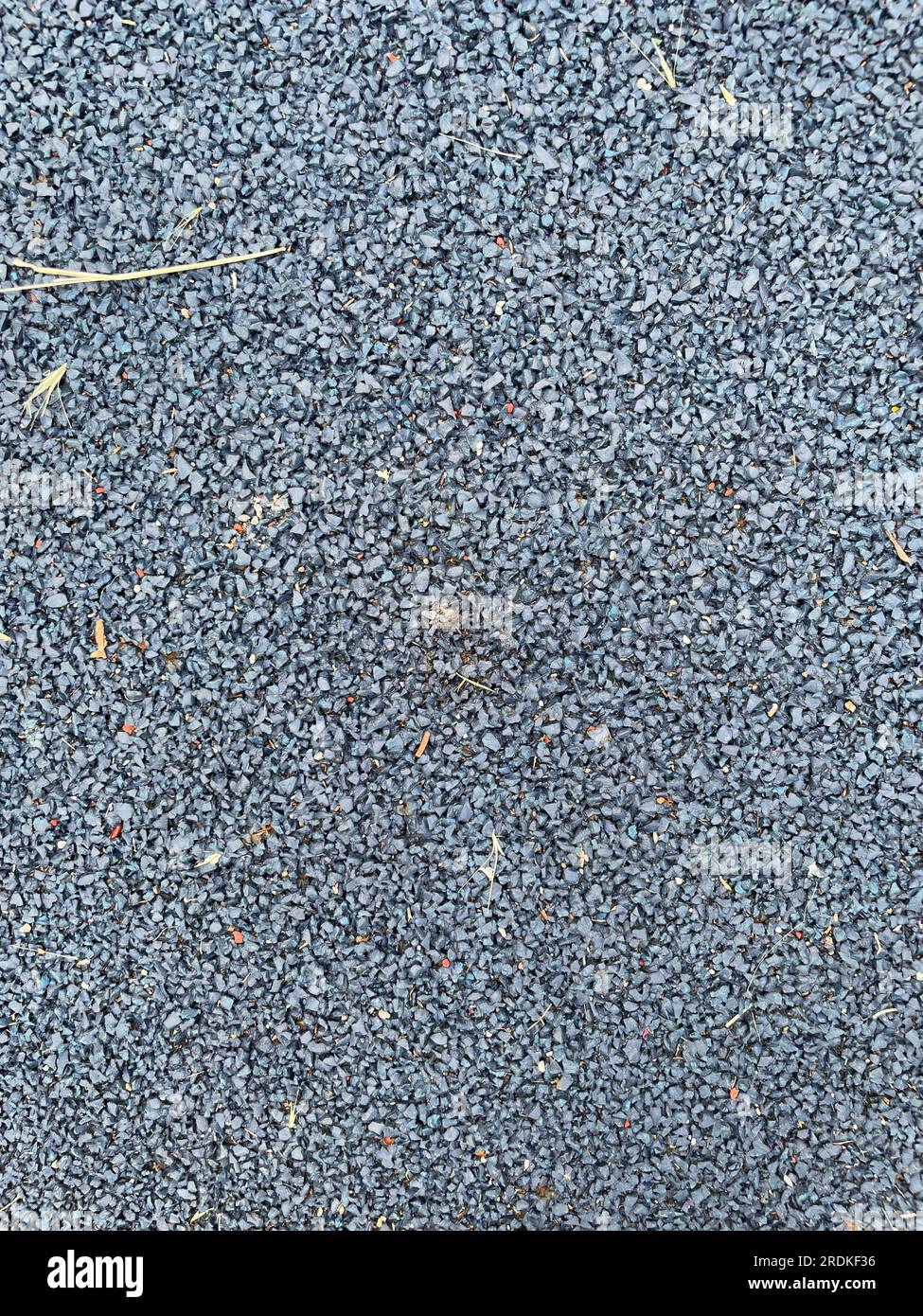 Black all-weather synthetic track surfacing made of polyurethane used ...