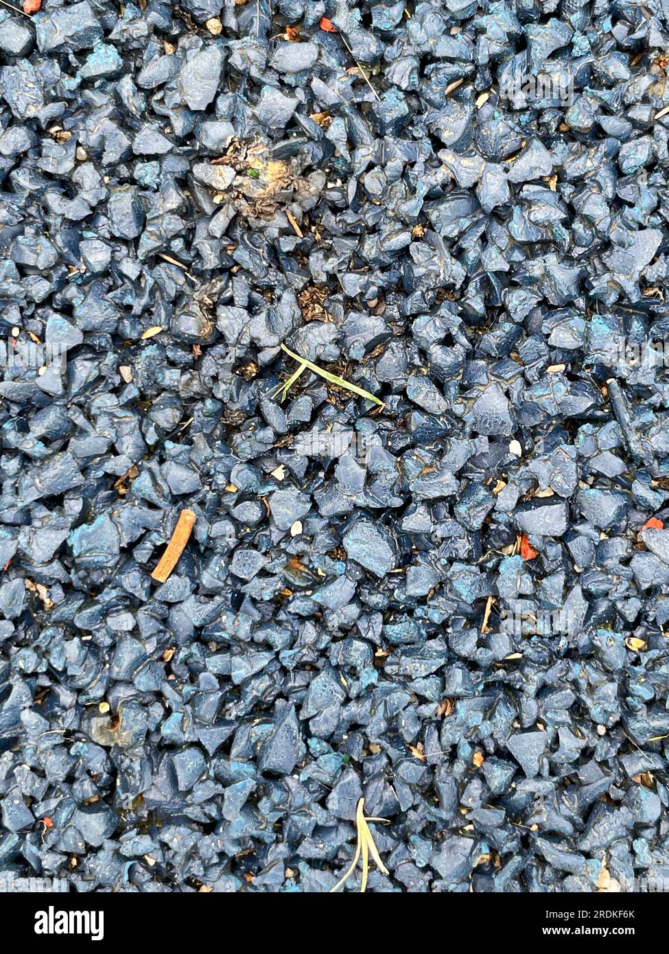 Black all-weather synthetic track surfacing made of polyurethane used ...