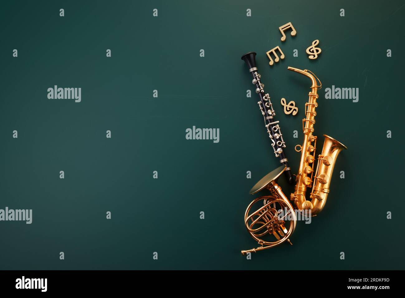 Music lesson school education concept. Wind instruments on green ...