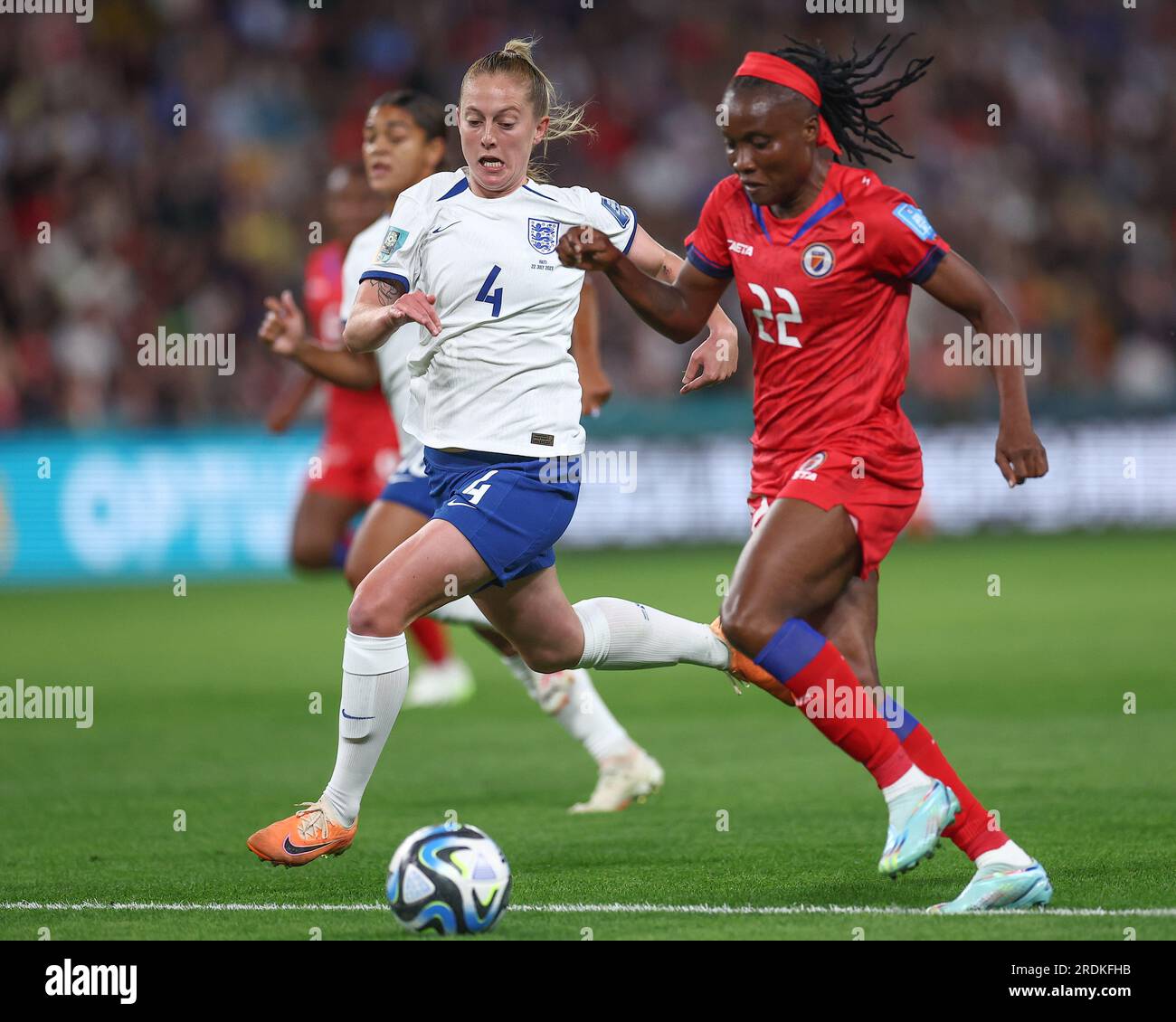 Roselord Borgella #22 of Haiti holds the ball as Keira Walsh #4 of ...