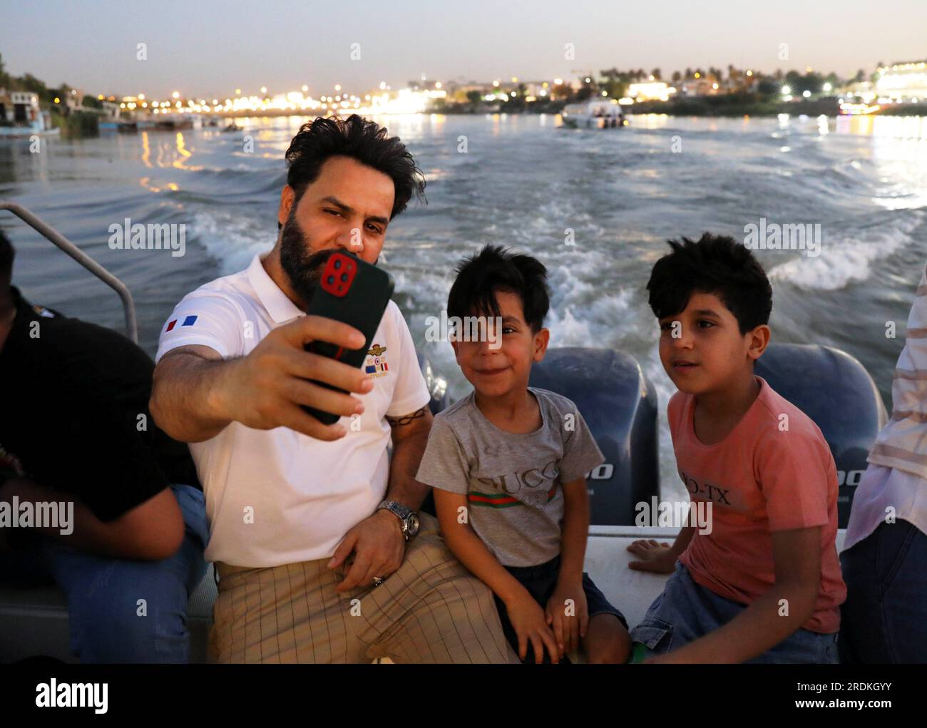 Baghdad, Iraq. 16th July, 2023. People take a selfie in a river taxi in ...