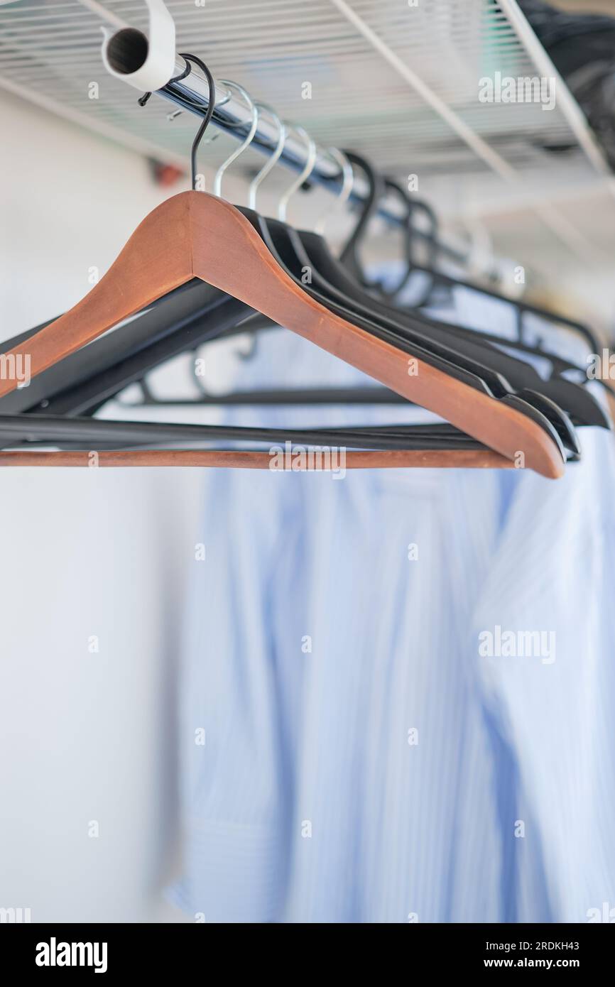 Vertical frame, closet hanger with empty hangers, sale idea Stock Photo ...