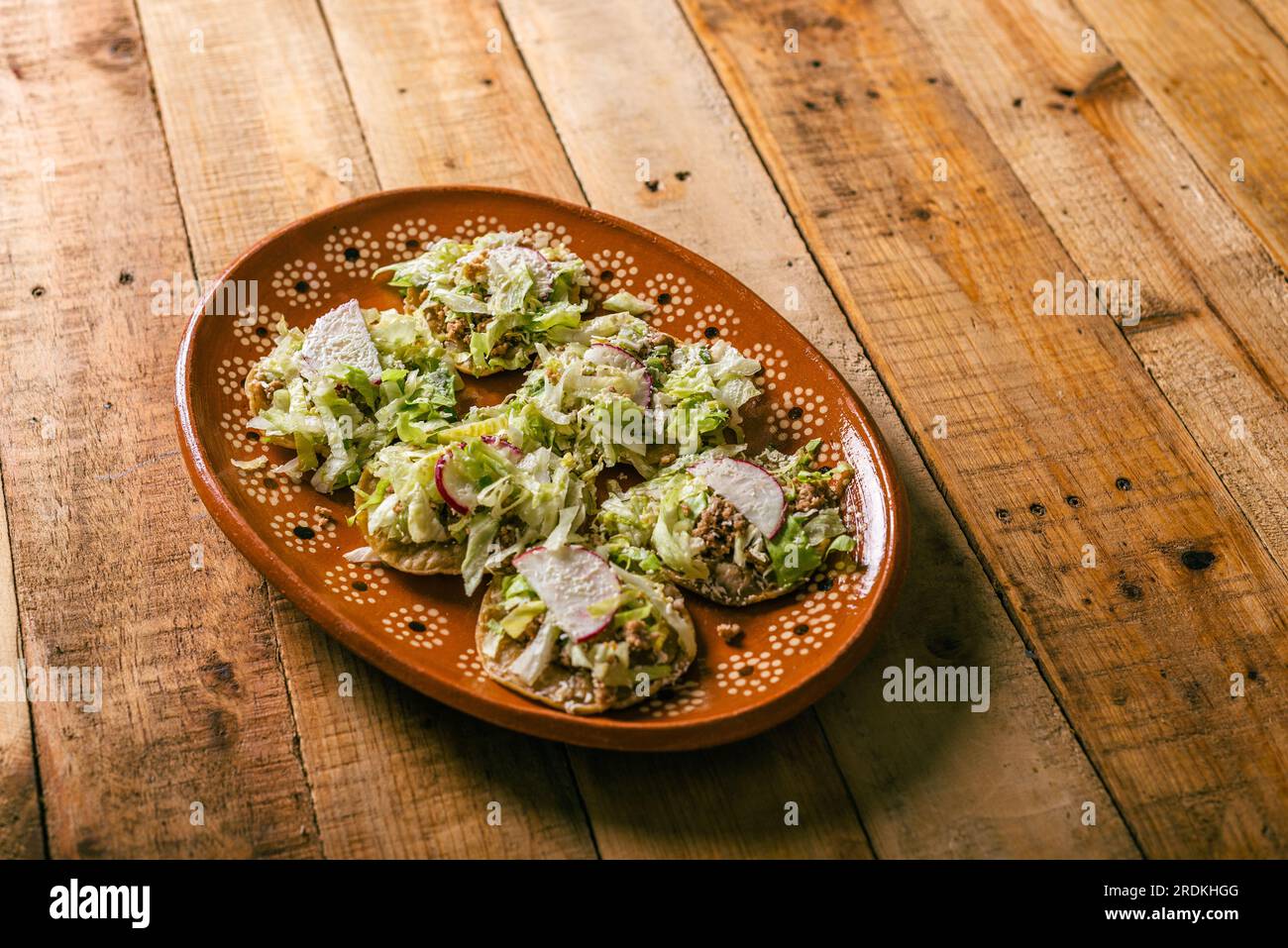 Colima style sopitos plate on wooden table. Typical mexican food Stock ...
