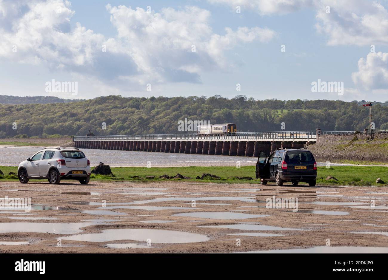 Northern Rail class 156 sprinter train crossing the Kent viaduct at ...