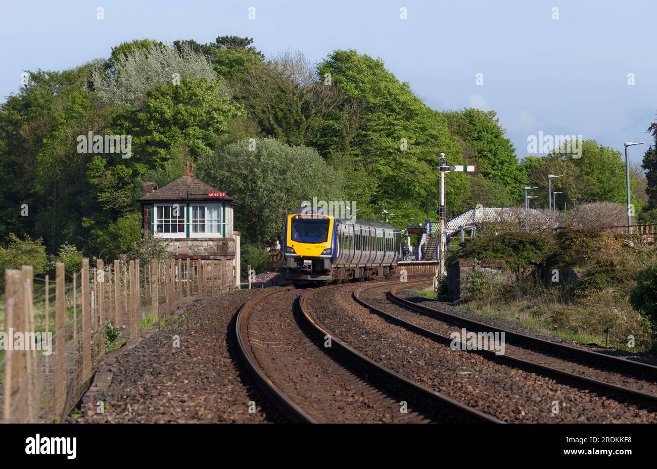 Northern rail class 195 train at Arnside passing the Furness Railway ...