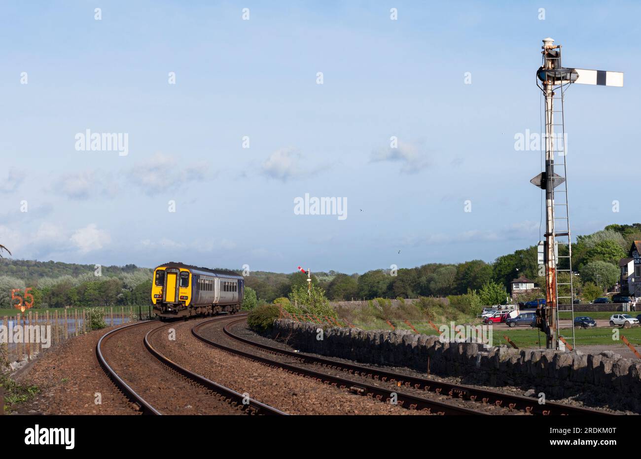 Northern Rail class 156 sprinter diesel multiple unit train 156463 passing Arnside with a ...