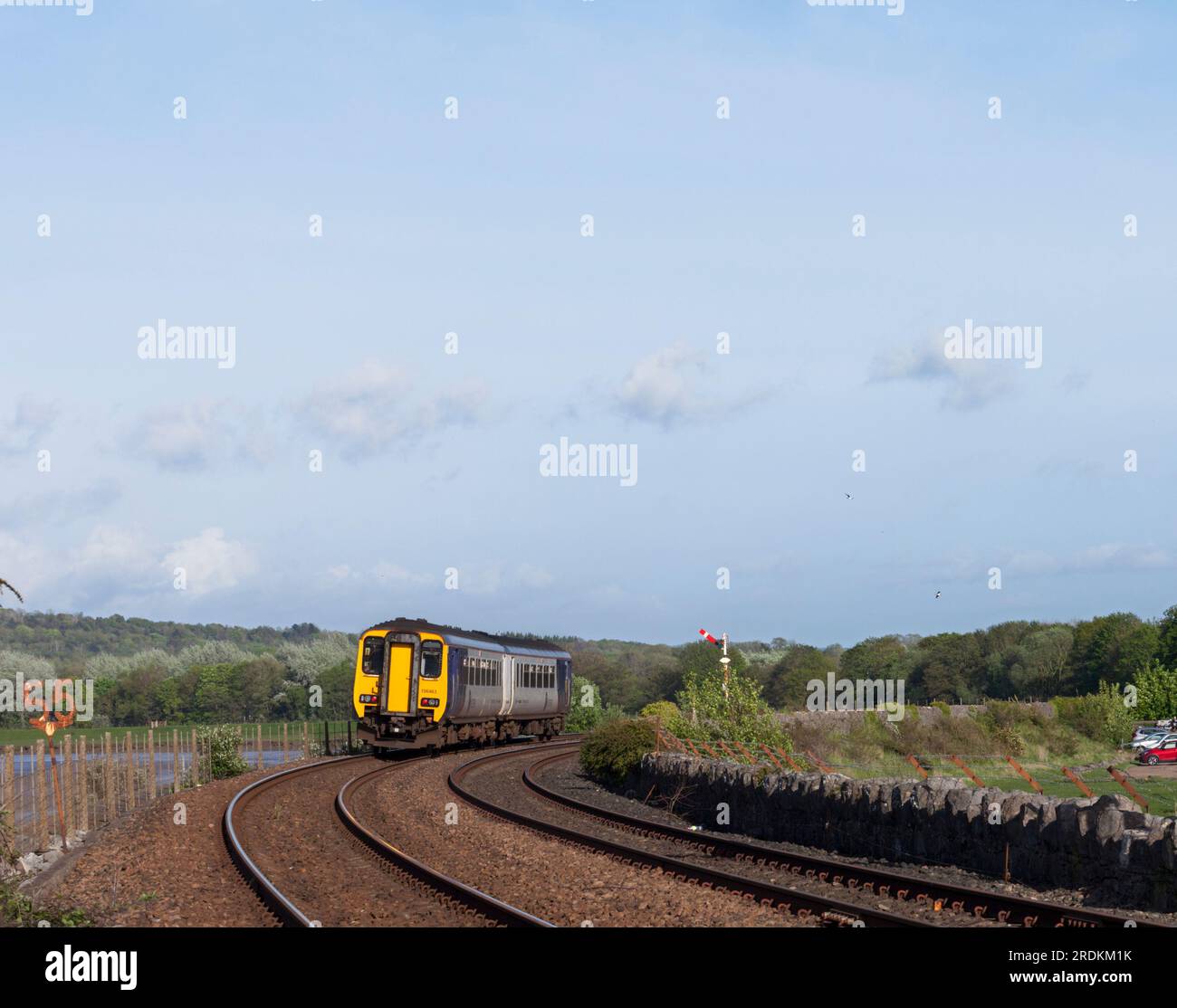 Northern Rail class 156 sprinter diesel multiple unit train 156463 passing Arnside Stock Photo ...