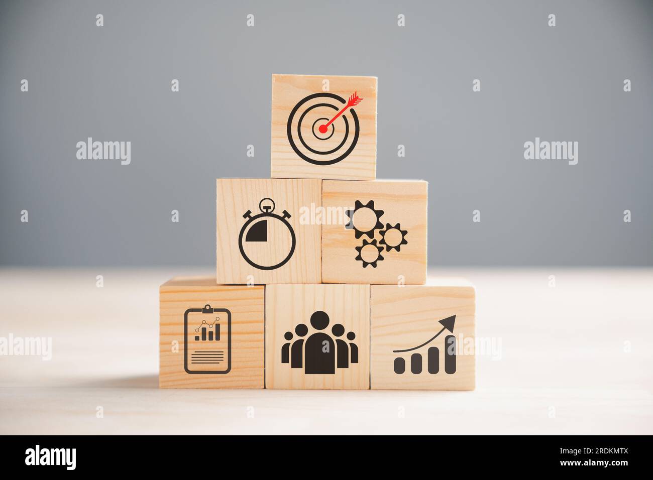 Wooden block cude step on table with Action Plan Stock Photo - Alamy
