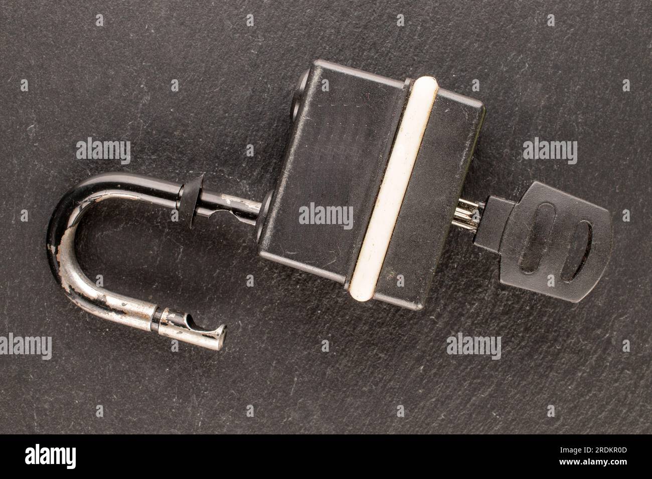 One door lock and key on slate stone, close-up, top view Stock Photo ...