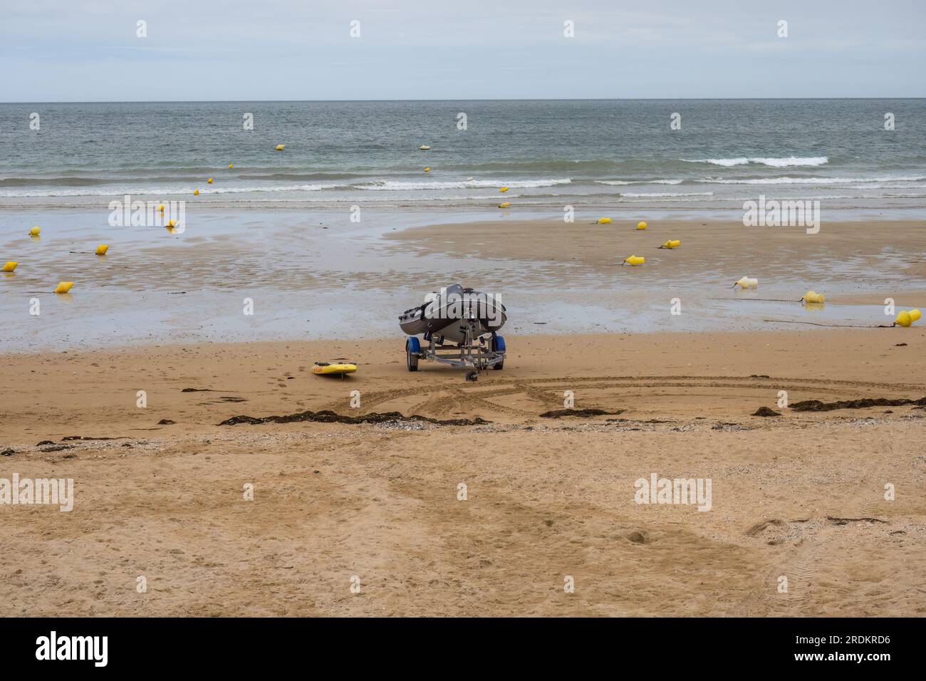 01.07.2023 Sword Beach, Ouistreham, Normandy, France. Four people enjoy ...