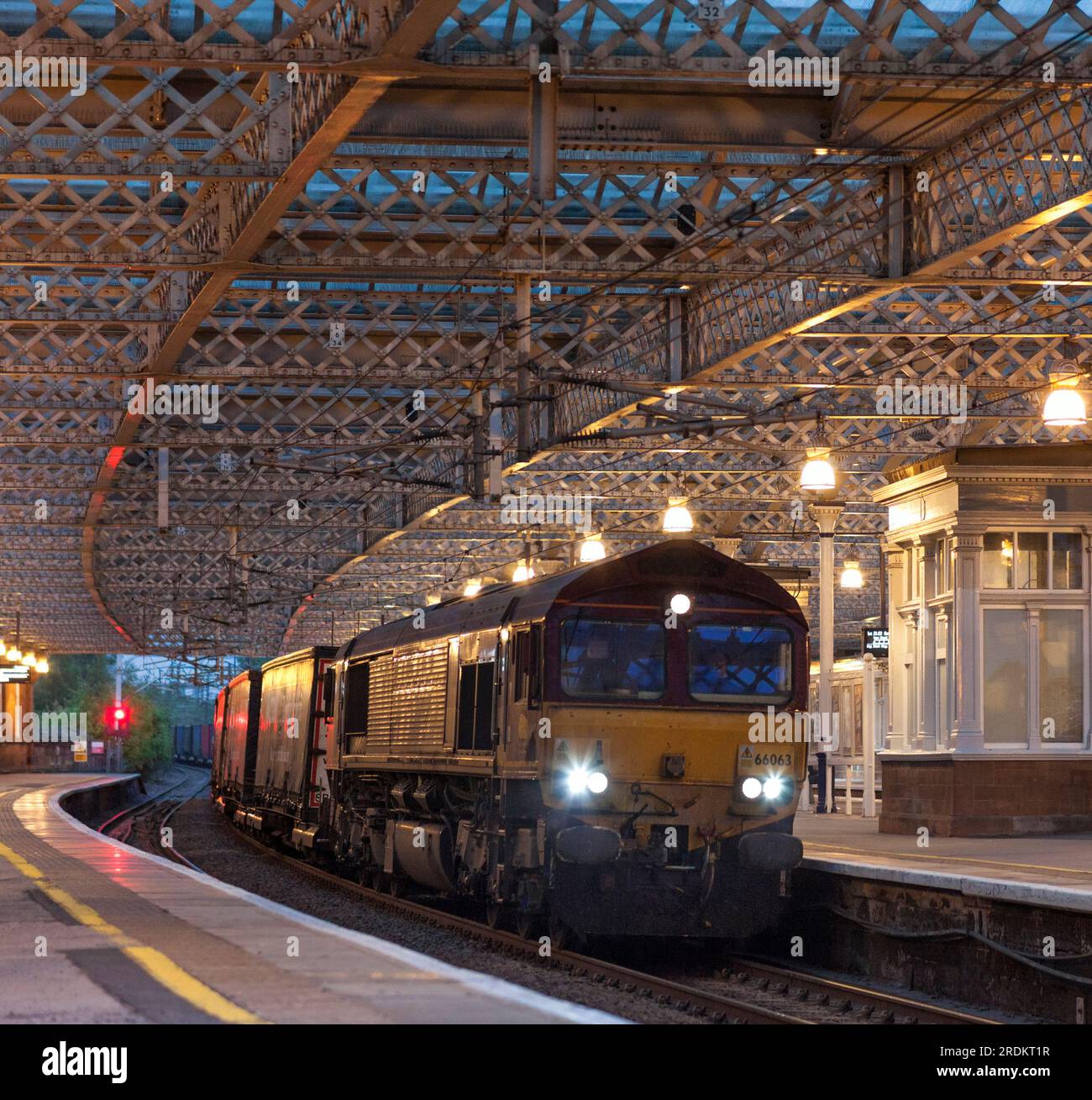 Db Cargo Rail Class 66 Diesel Locomotive 66063 Passing The Station At