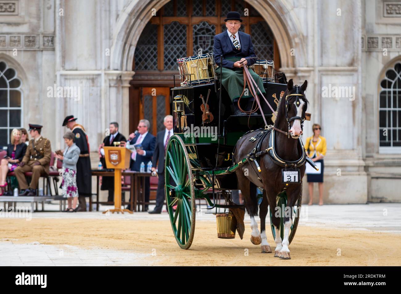 London, UK. 22 July 2023. A horse drawn carriage is one of many ...