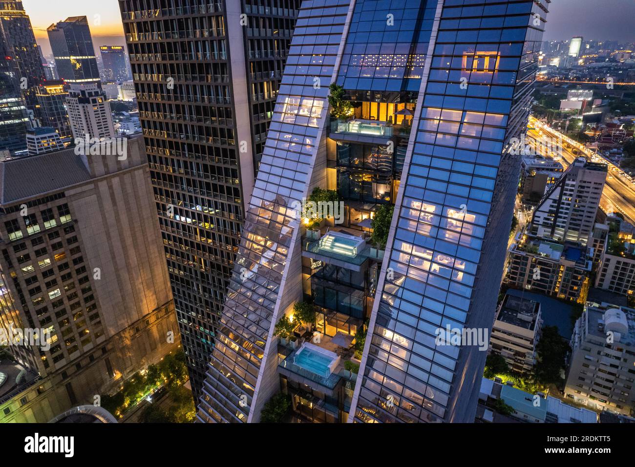 Aerial view of Ploenchit road by night in Bangkok Downtown, financial ...