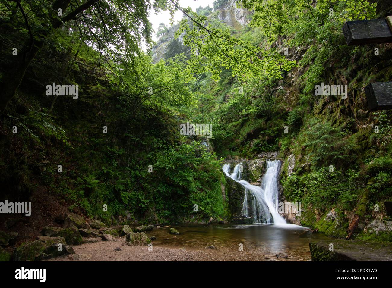 Waterfall with bridge at Allerheiligen waterfall cascade in a landscape ...