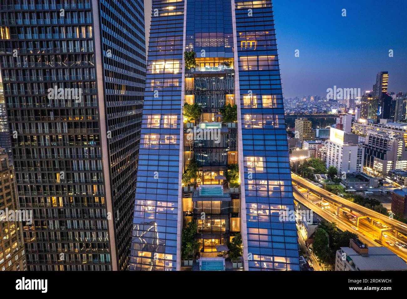 Aerial view of Ploenchit road by night in Bangkok Downtown, financial ...