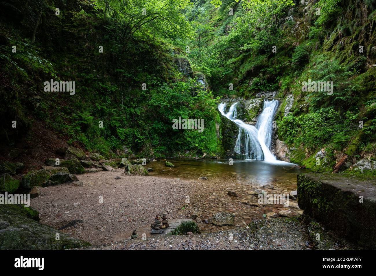 Waterfall with bridge at Allerheiligen waterfall cascade in a landscape ...