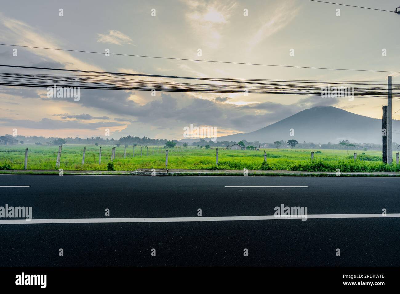 Traveling the scenic road of Calauan, Laguna in the Philippines Stock ...