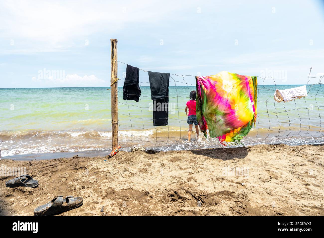 Summer vibes at the beach front with relaxing breeze of air and splash ...
