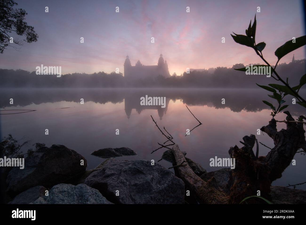 Majestic Sunrise: Schloss Johannisburg in Aschaffenburg, Main River. A ...