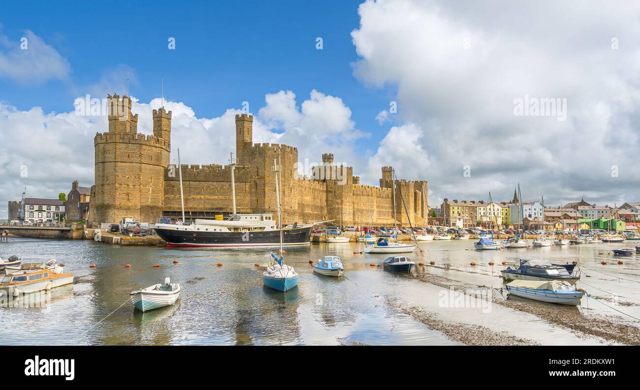 Caernarfon Castle on the Seiont River and the Menai Strait in North ...