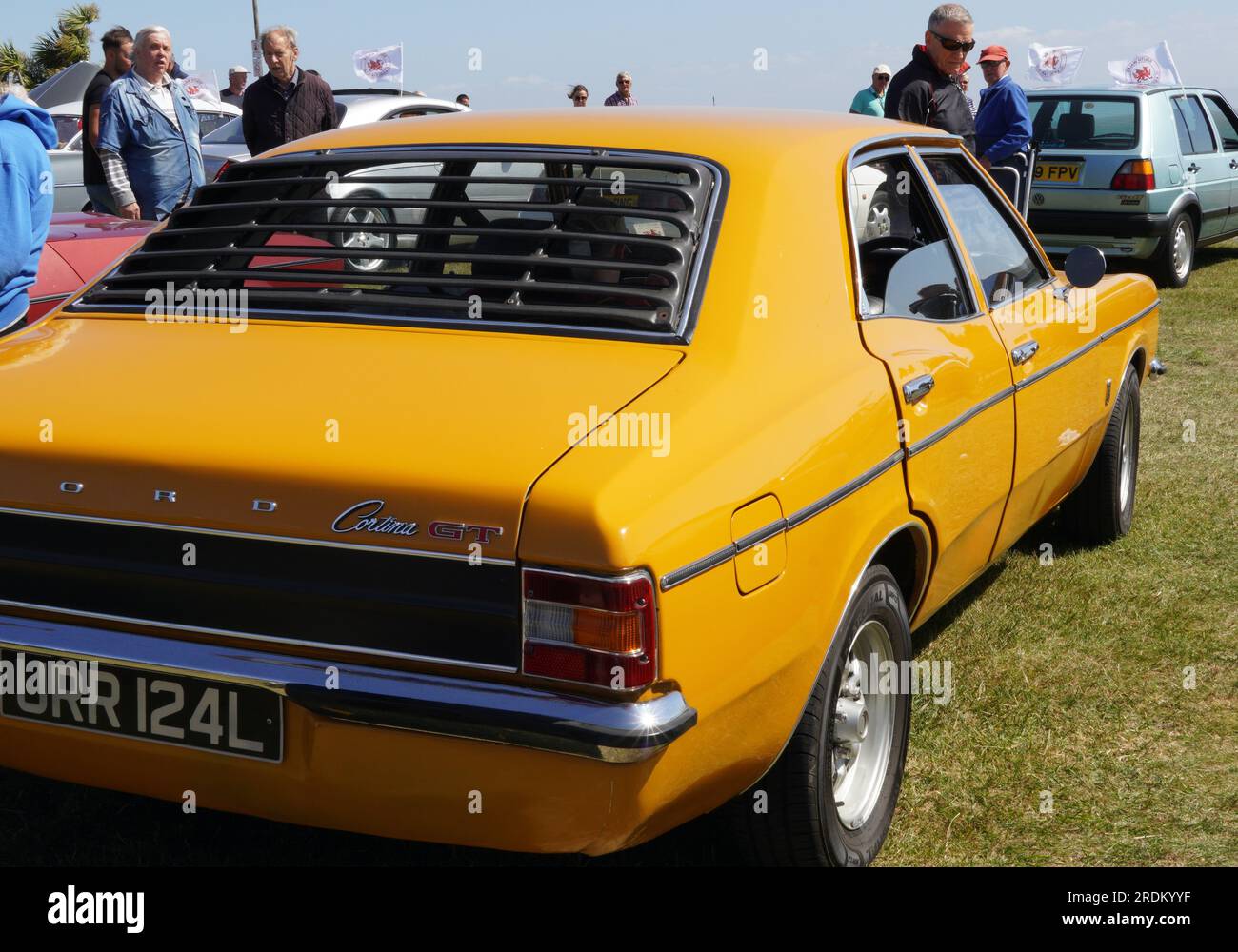 Classic yellow Ford Cortina mark 3 parked on seafront promenade for car ...