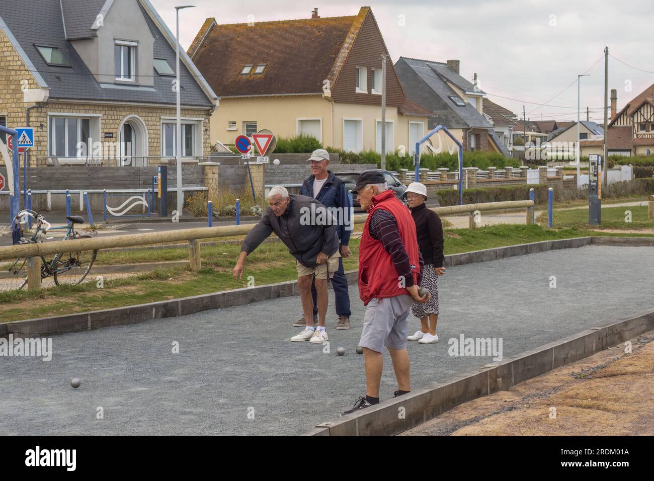 01.07.2023 Sword Beach, Ouistreham, Normandy, France. Four people enjoy ...