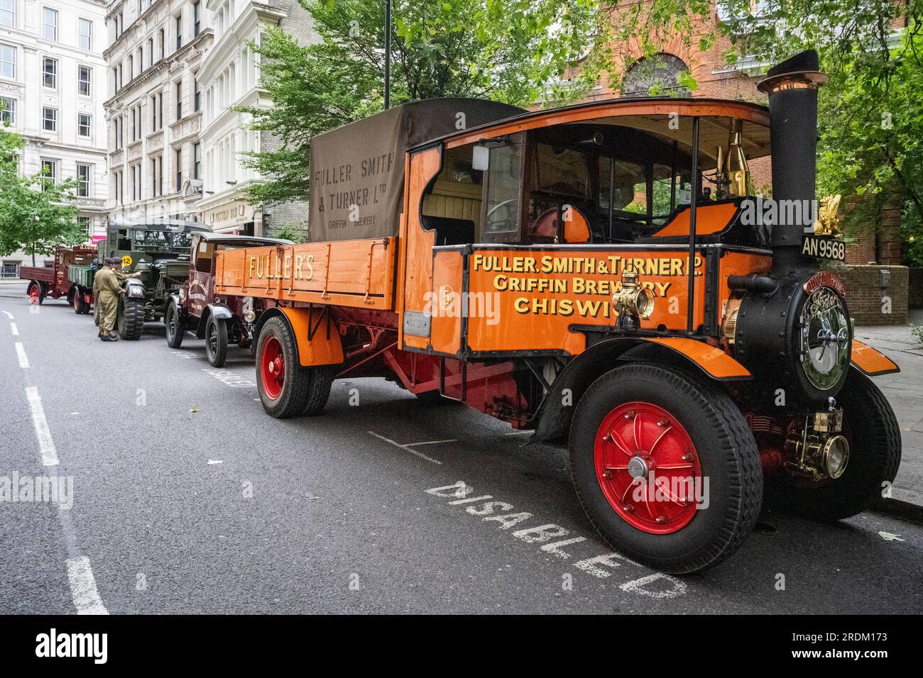 London, UK. 22 July 2023. Traditional vehicles parked up ahead of ...