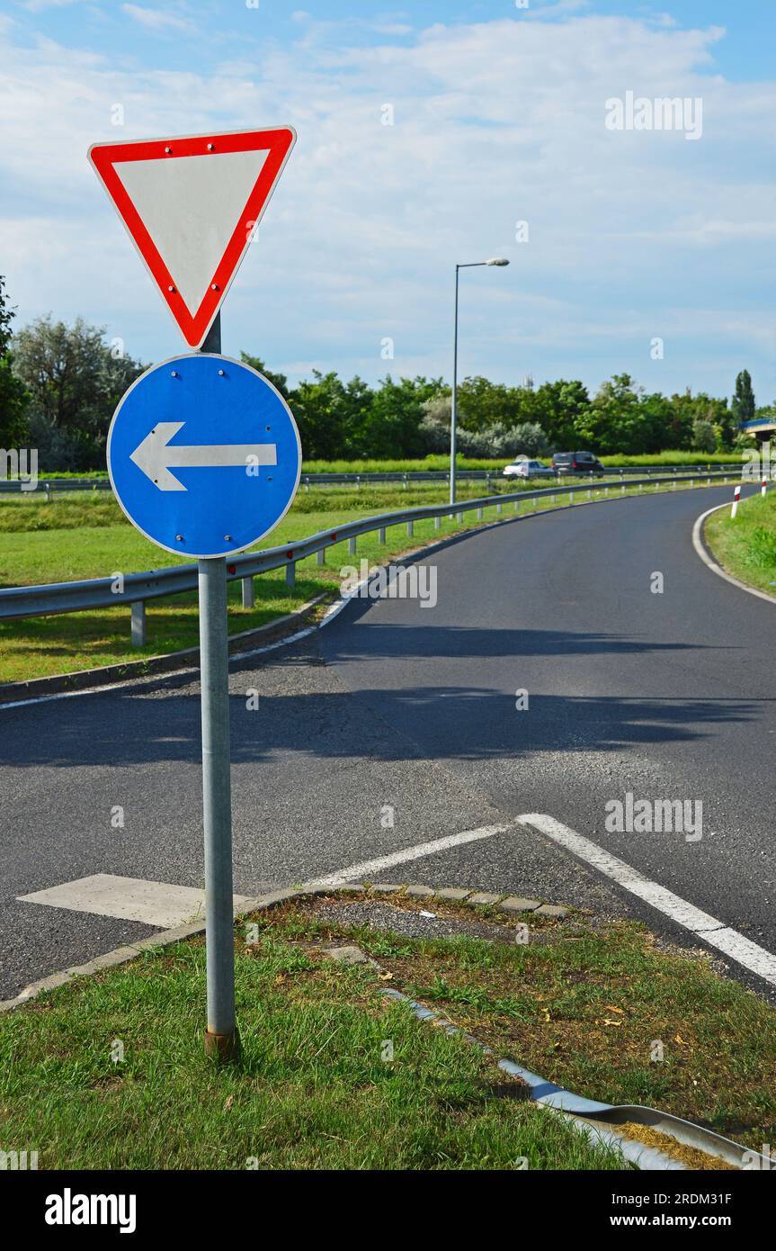 Road signs at the exit from the parking lot to the freeway in Hungary ...