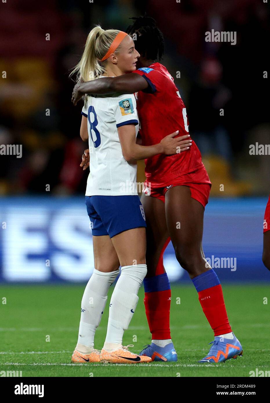 England's Chloe Kelly (left) and Haiti's Kethna Louis embrace after the ...
