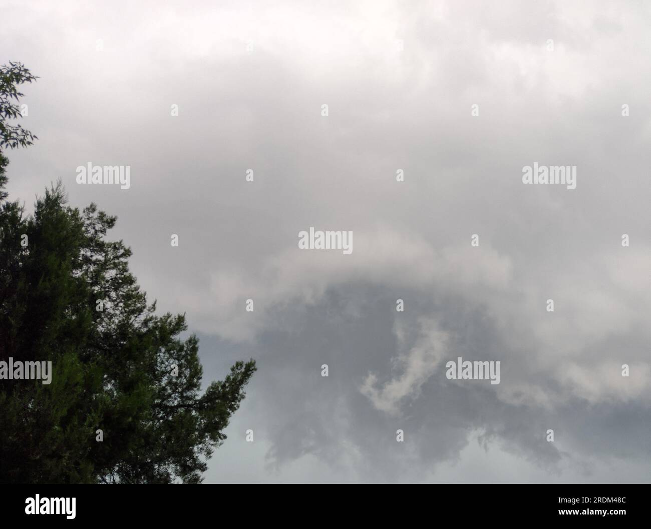 Sky full of rain clouds in Romania. The rain is coming Stock Photo - Alamy
