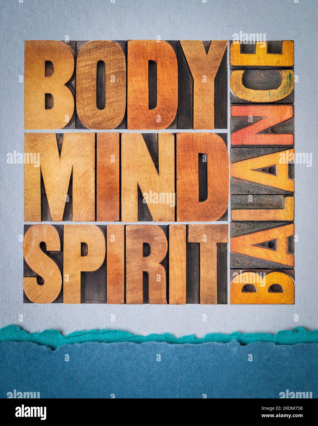 body, mind and spirit balance - a collage of text in vintage wood ...