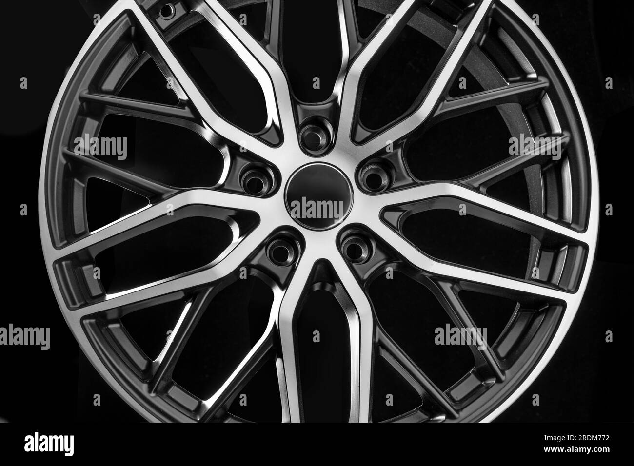 Cast disc with black and white thin spokes Stock Photo - Alamy