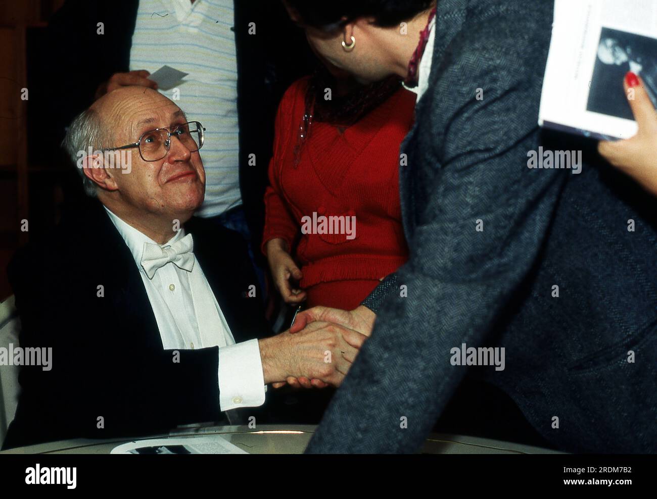Mstislav Rostropovich, Russian cellist, signing autographs after a ...