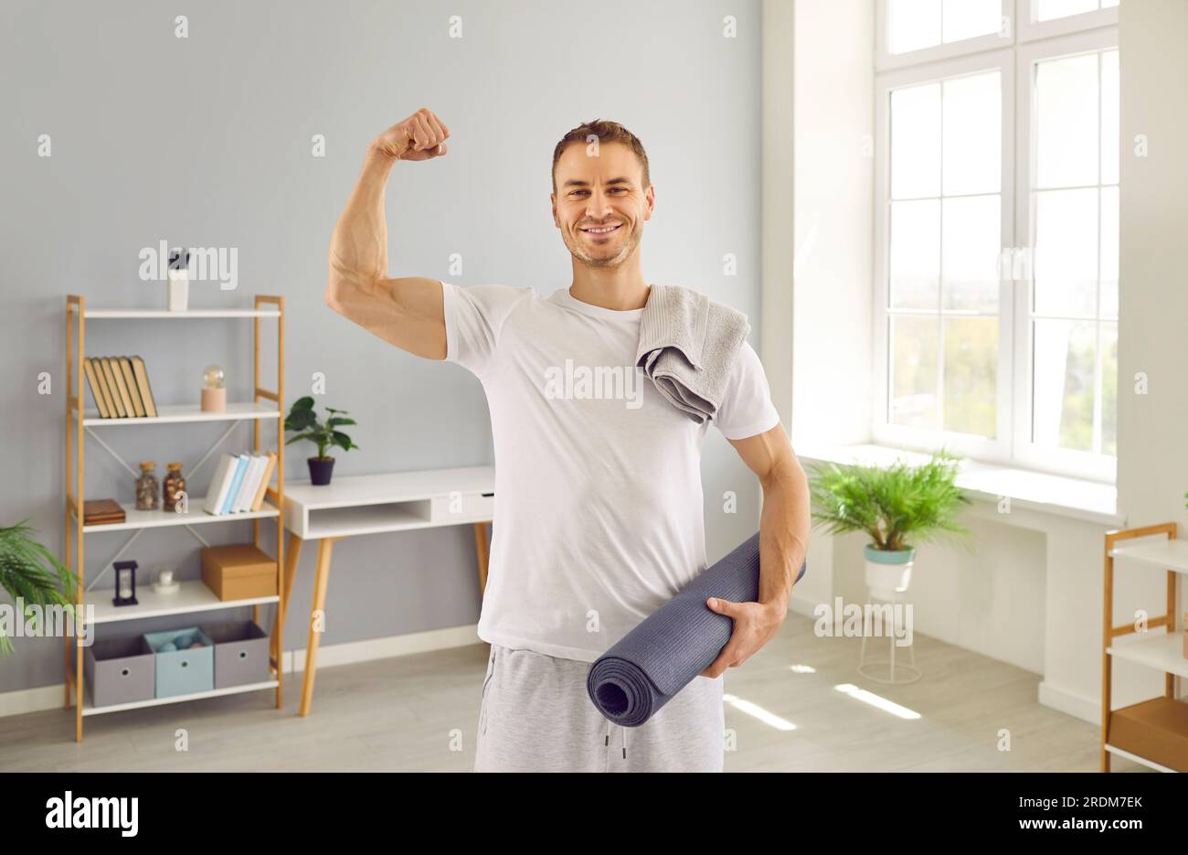Strong male figure holding hi-res stock photography and images - Alamy