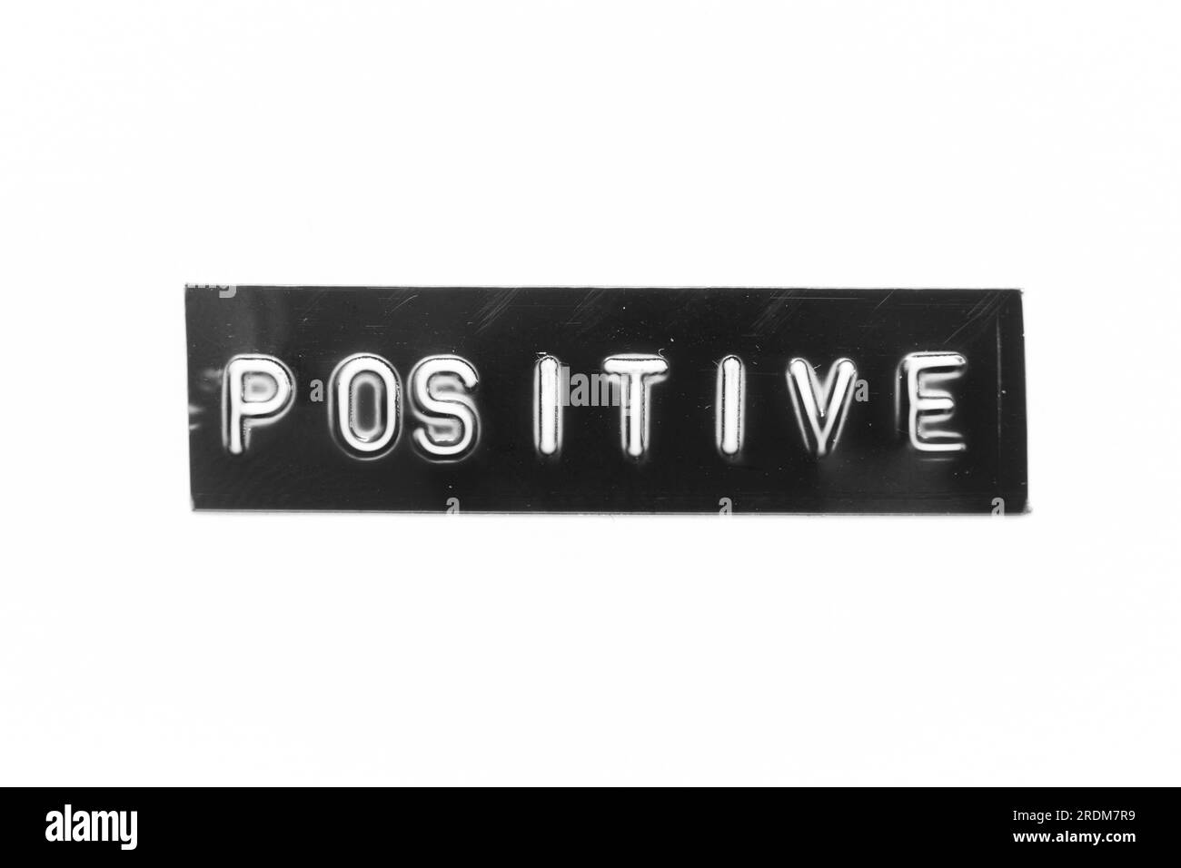 Black color banner that have embossed letter with word positive on ...
