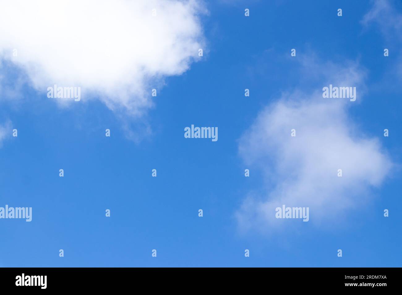 Clear blue color sky with white cloud background Stock Photo - Alamy
