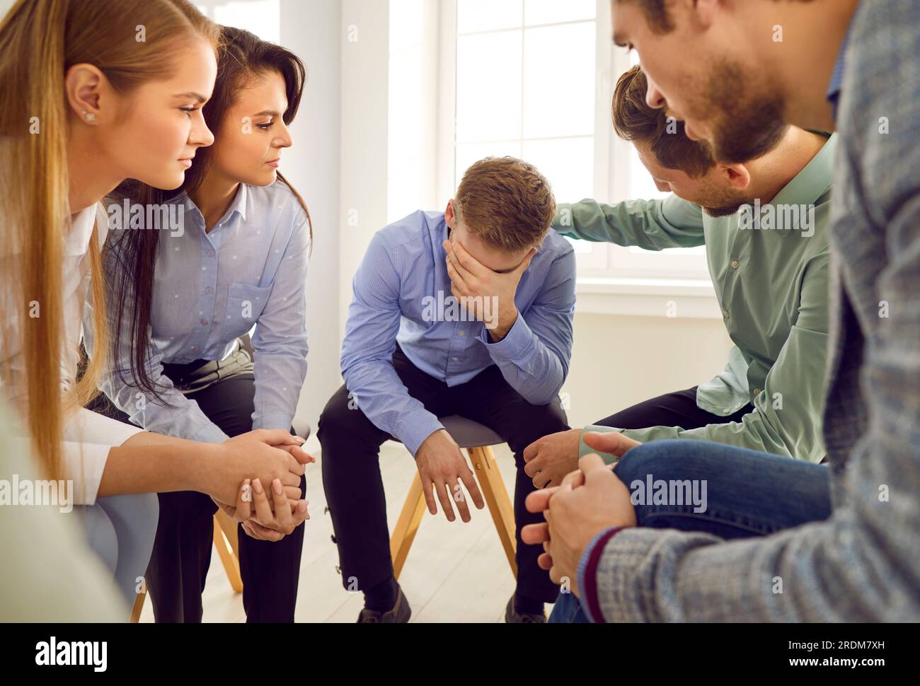 Team of colleagues, friends, or people in group therapy trying to ...