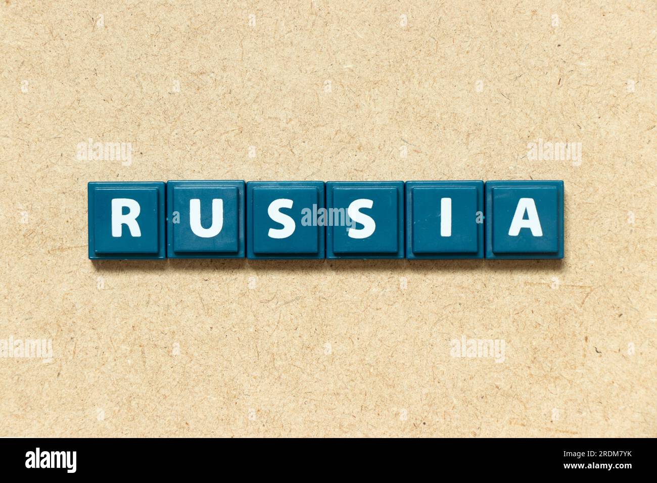 Tile alphabet letter in word russia on wood background Stock Photo - Alamy