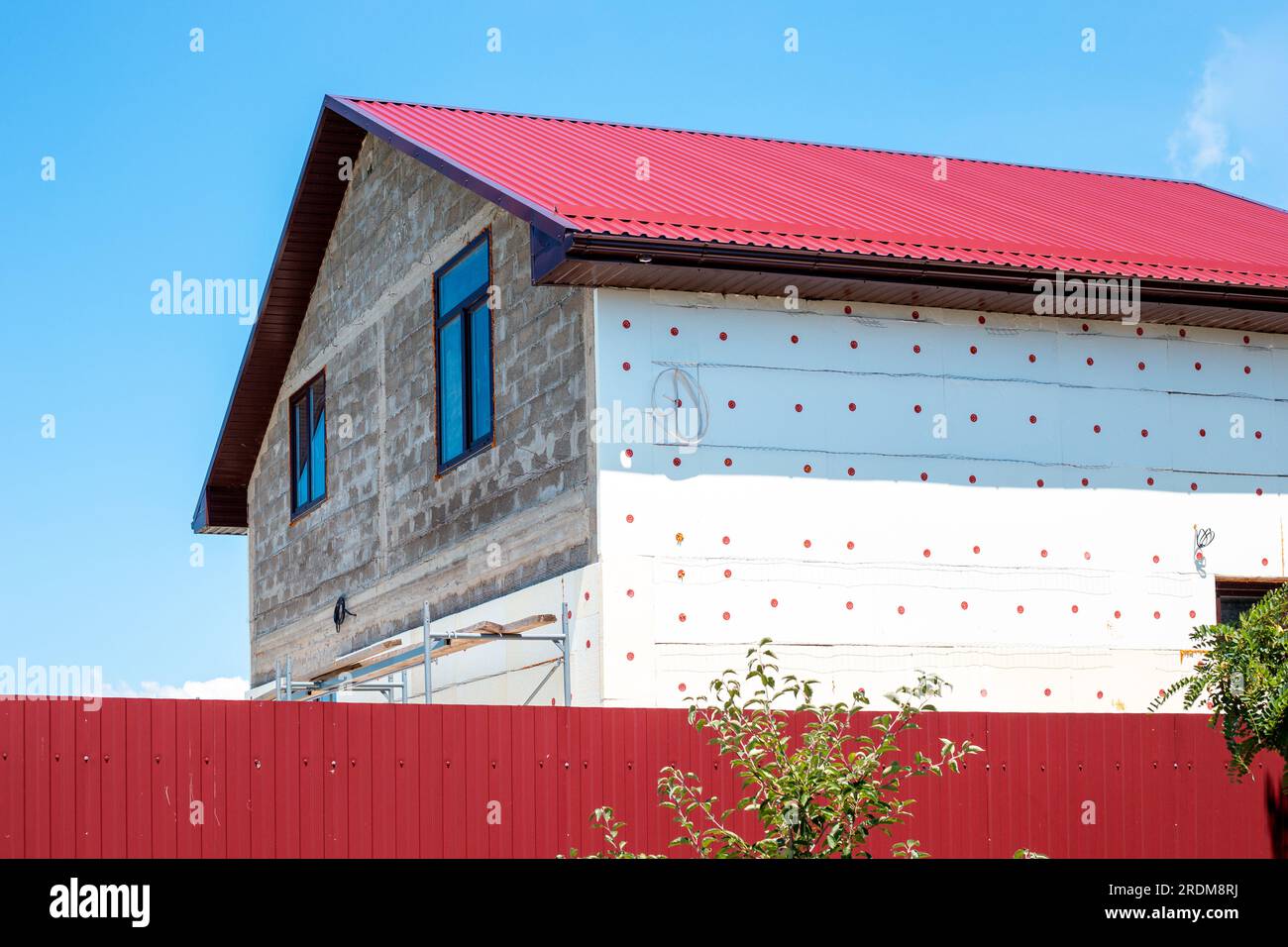 Construction of a private country house. Insulation of aerated concrete ...