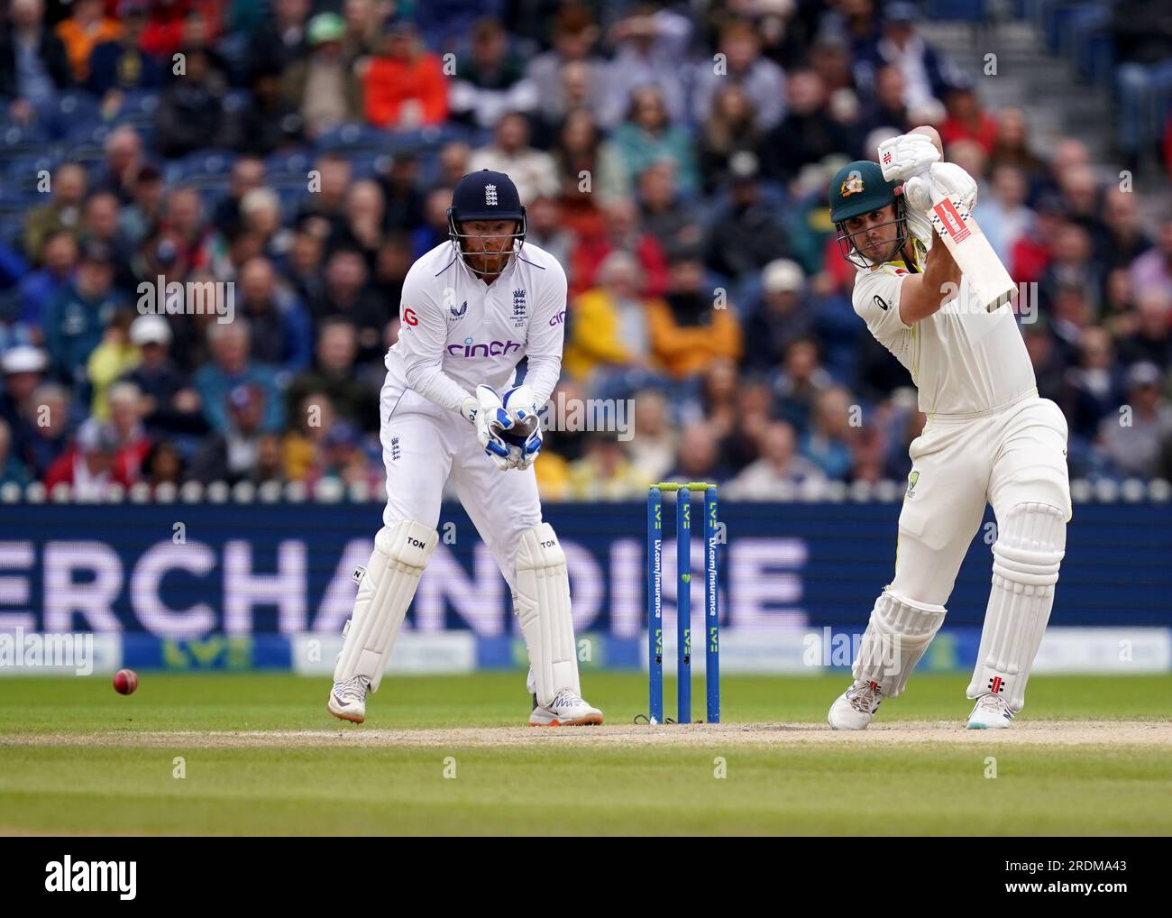 Australia's Mitchell Marsh (right) bats and England's Jonny Bairstow ...