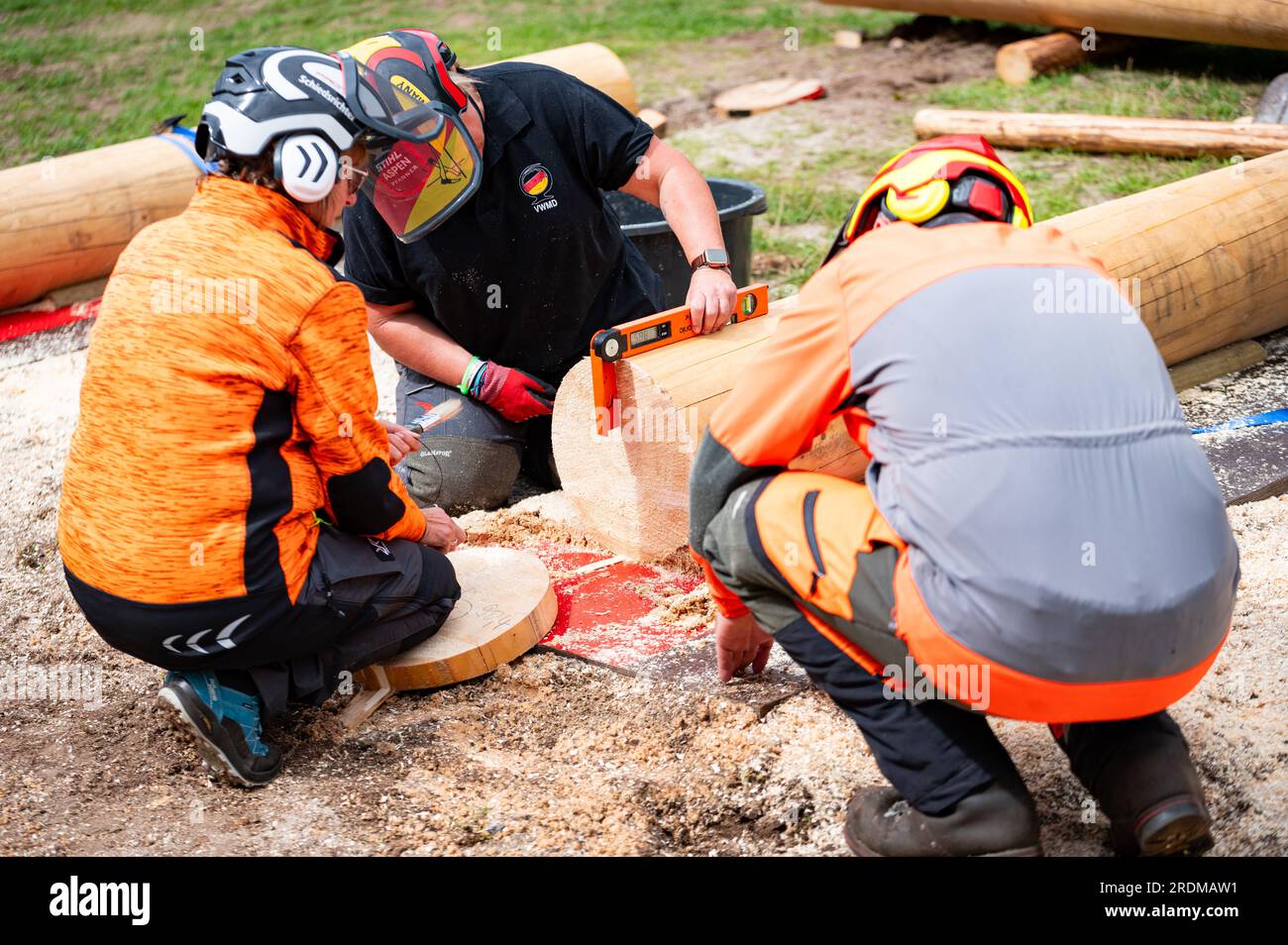 Daldorf, Germany. 22nd July, 2023. Referees inspect a log after a ...