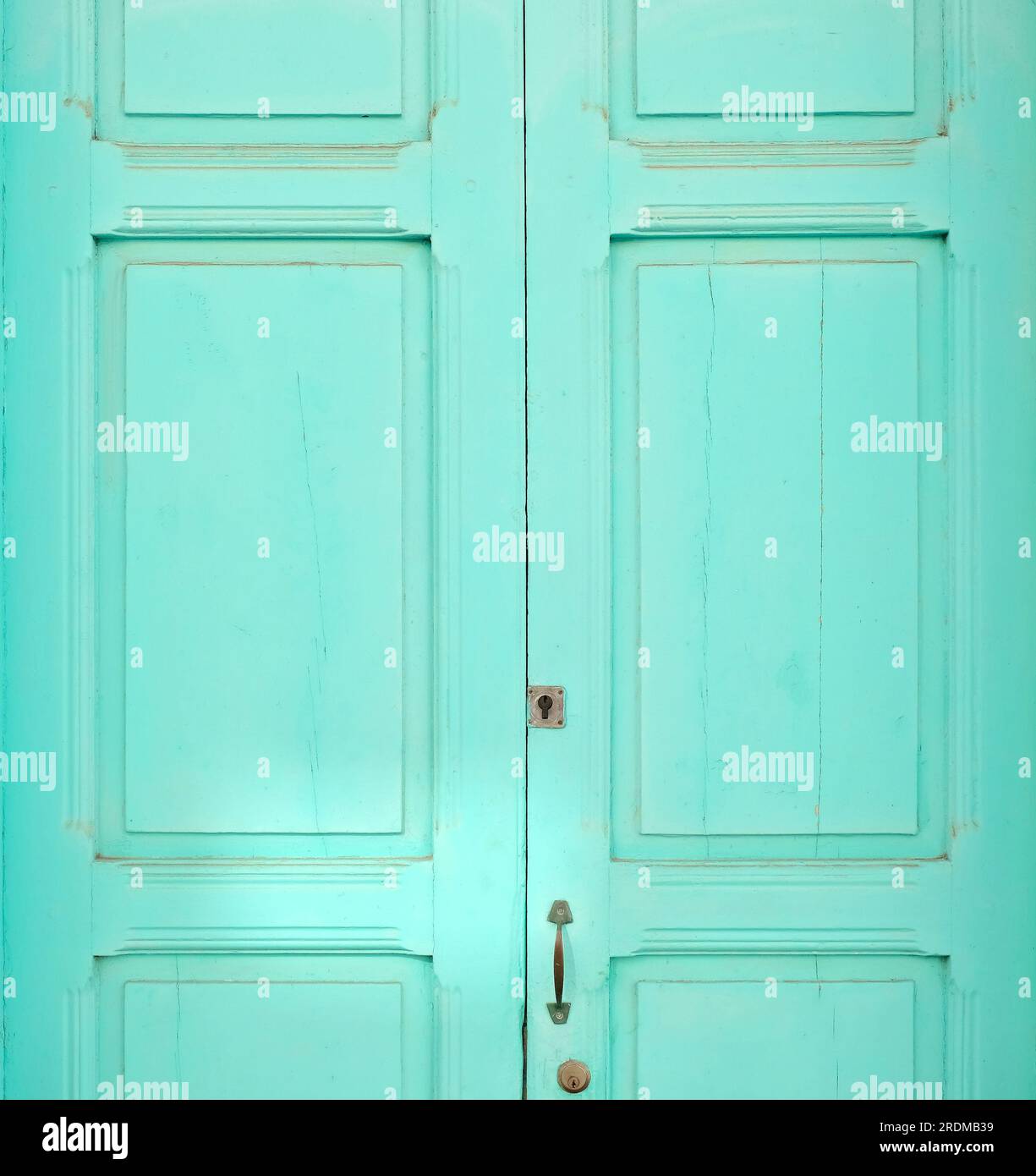 Plain wooden door painted pastel turquoise color Stock Photo - Alamy