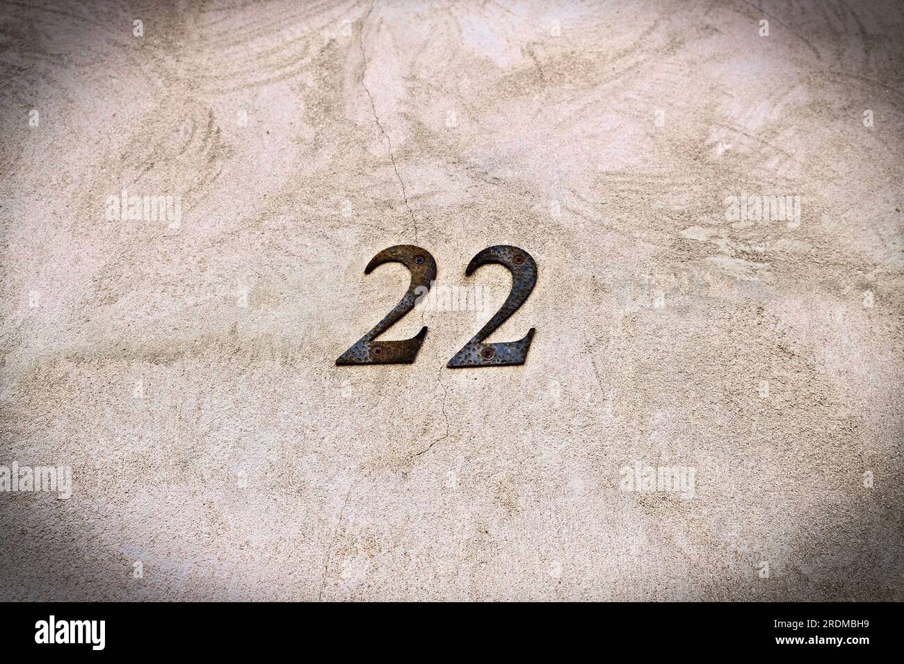 Number 22, twenty-two, simple metal digits on plain gray background ... Number 22, twenty-two, simple metal digits on plain gray background ...