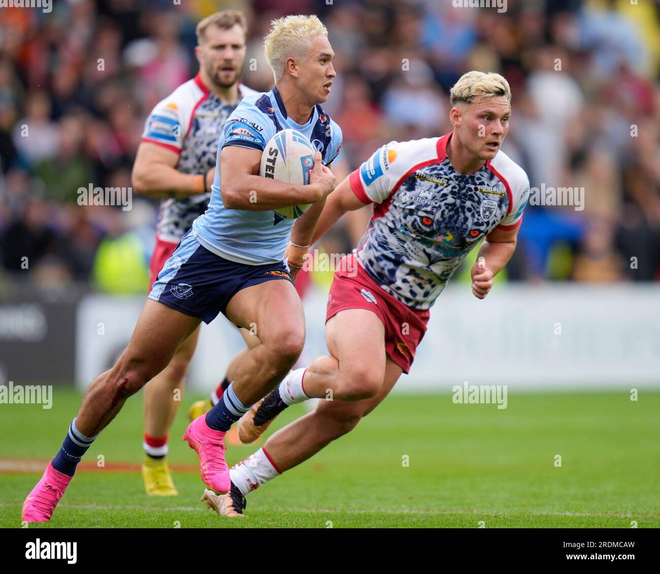 Tee Ritson #25 of St. Helens makes a break during the Betfred Challenge ...
