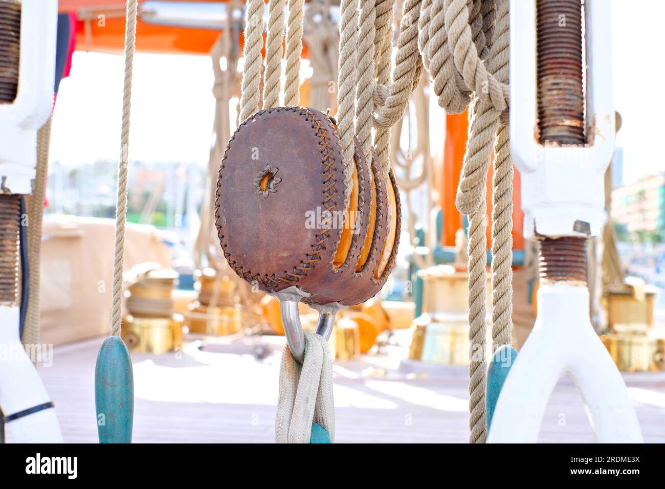 Large wooden block in a leather hand sewn cover and hempen lines ...