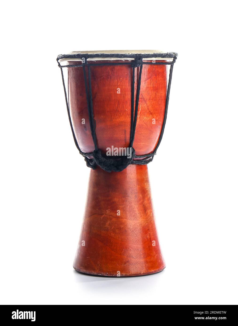 Little wooden djembe on white background Stock Photo - Alamy