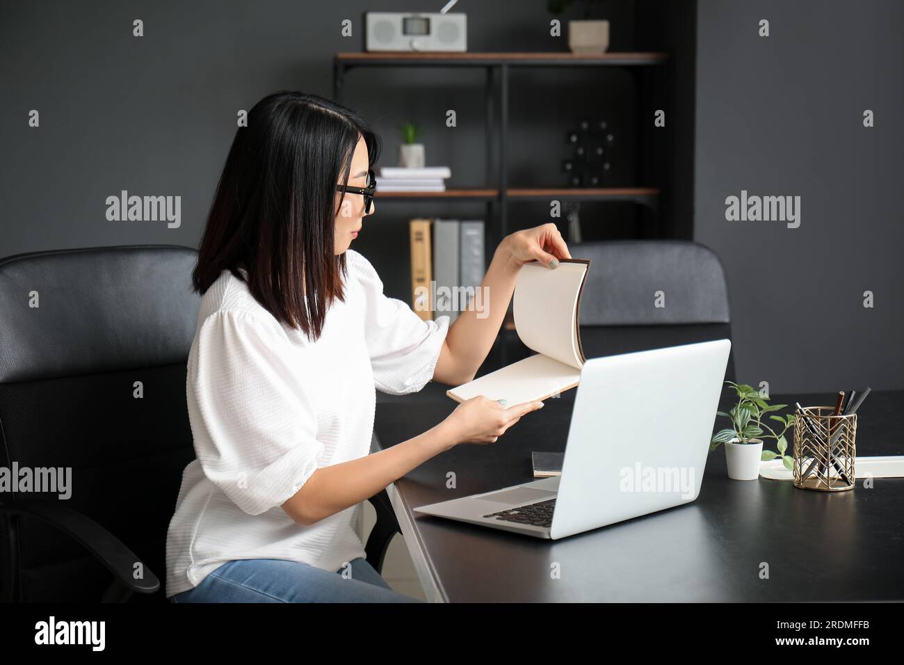 Female Asian HR specialist interviewing candidate online Stock Photo ...